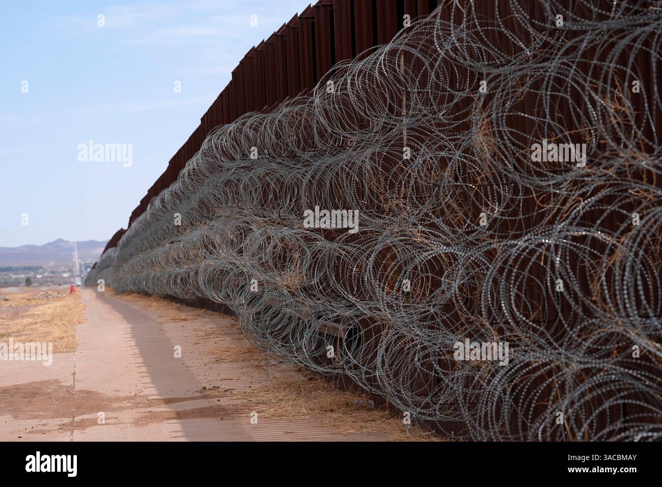 Newly installed concertina wire blankets a portion of the US-Mexico ...