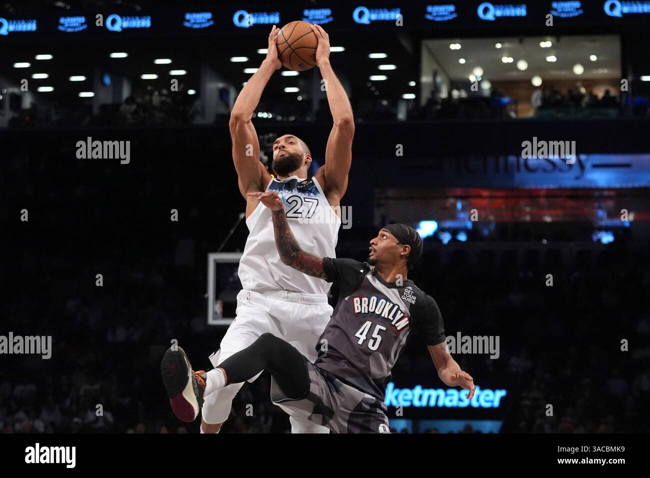 Minnesota Timberwolves' Rudy Gobert (27) fights for control of the ball ...