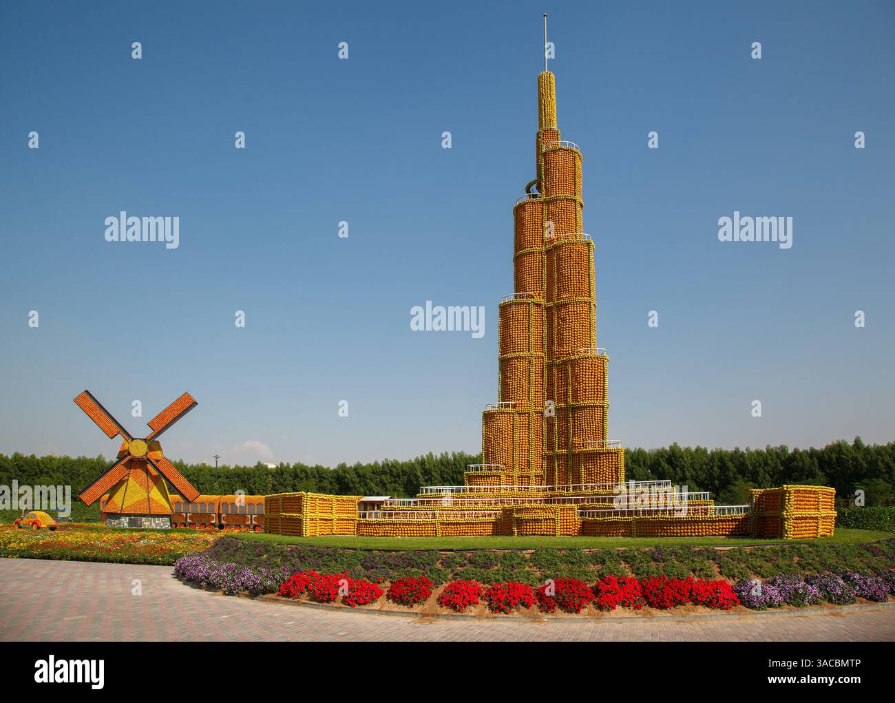 The Floral Burj Khalifa skyscraper, a windmill with beautiful colorful ...