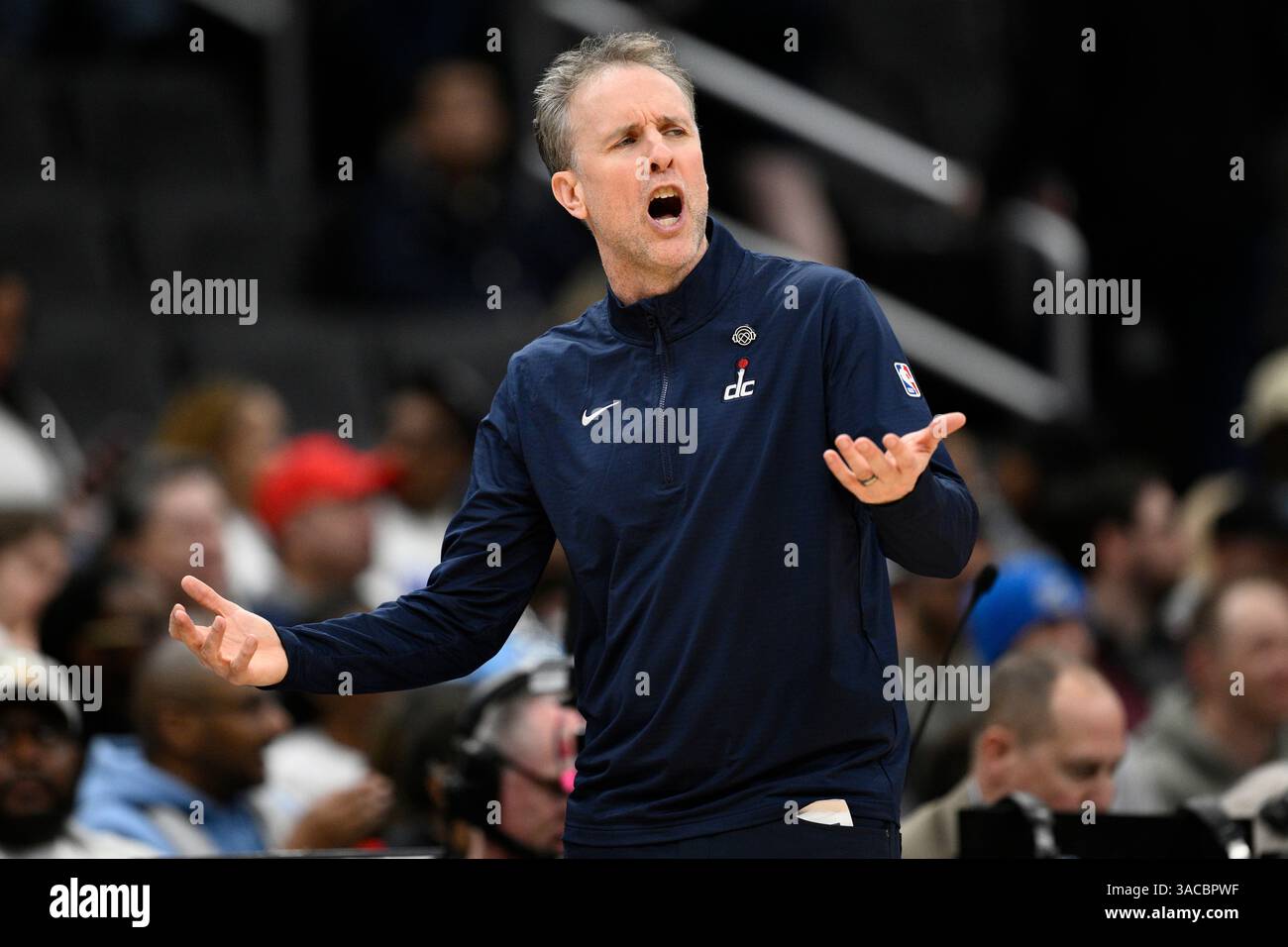Washington Wizards head coach Brian Keefe gestures during the second ...