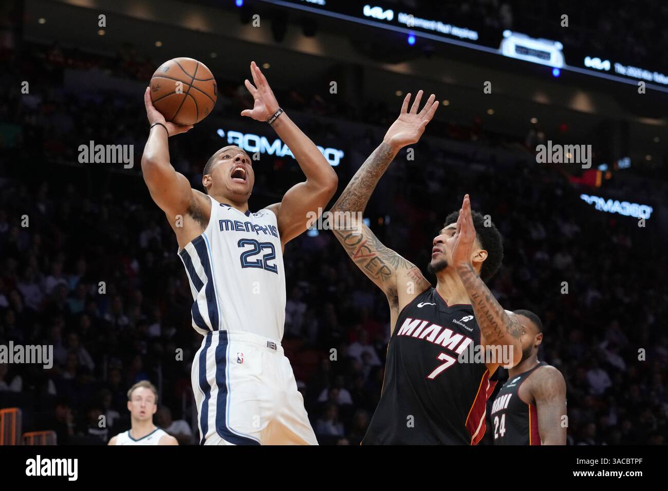 Memphis Grizzlies guard Desmond Bane (22) drives to the basket as Miami ...