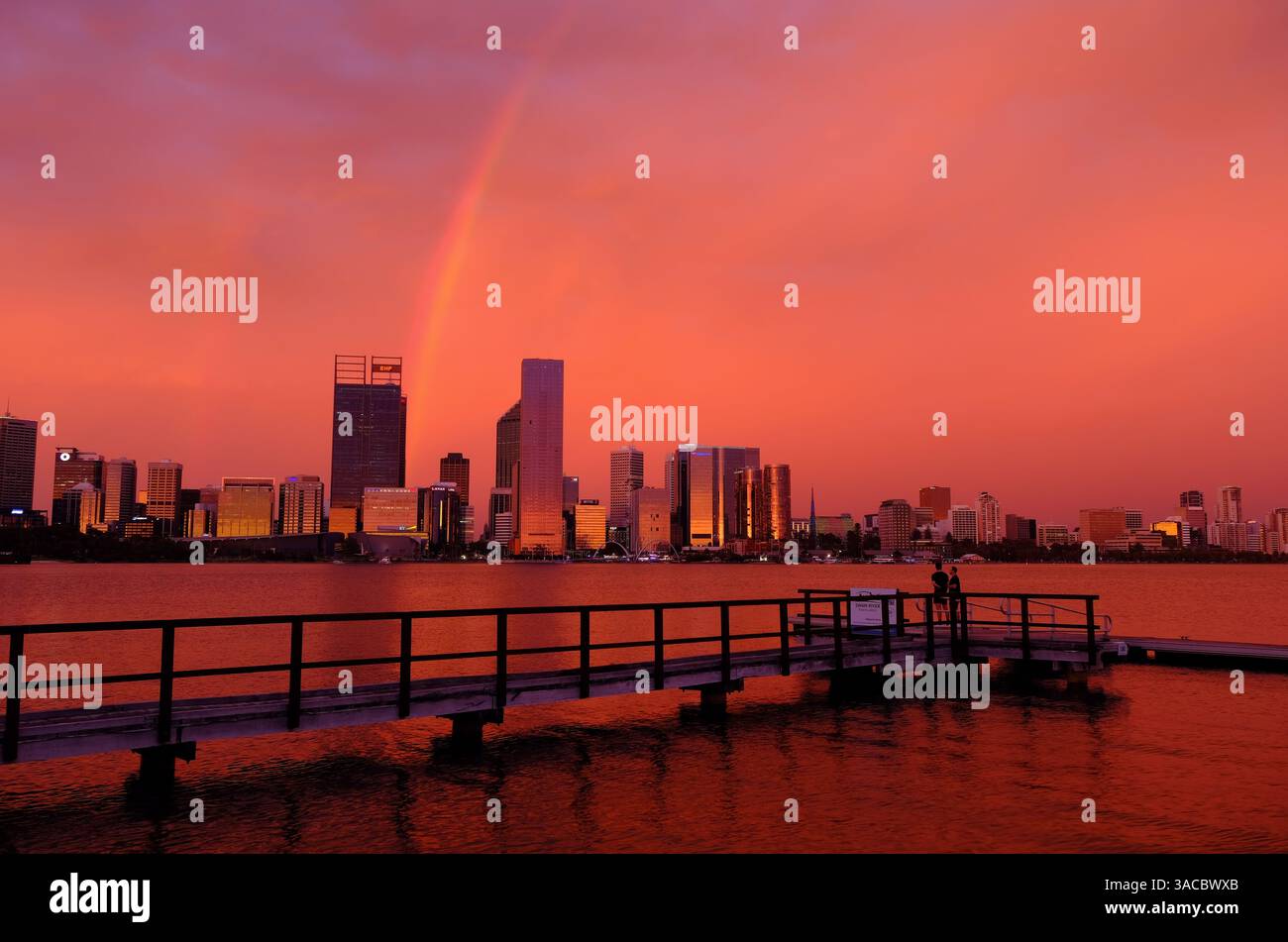 Perth: City skyline, Swan River, pier and rainbow over BHP building ...