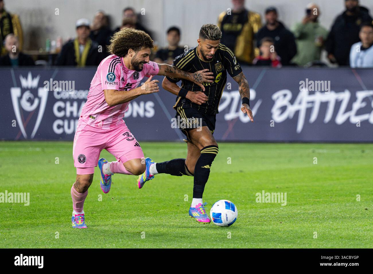 LAFC forward Denis Bouanga (99) is defended by Inter Miami CF defender Maximiliano Falcón (37 ...