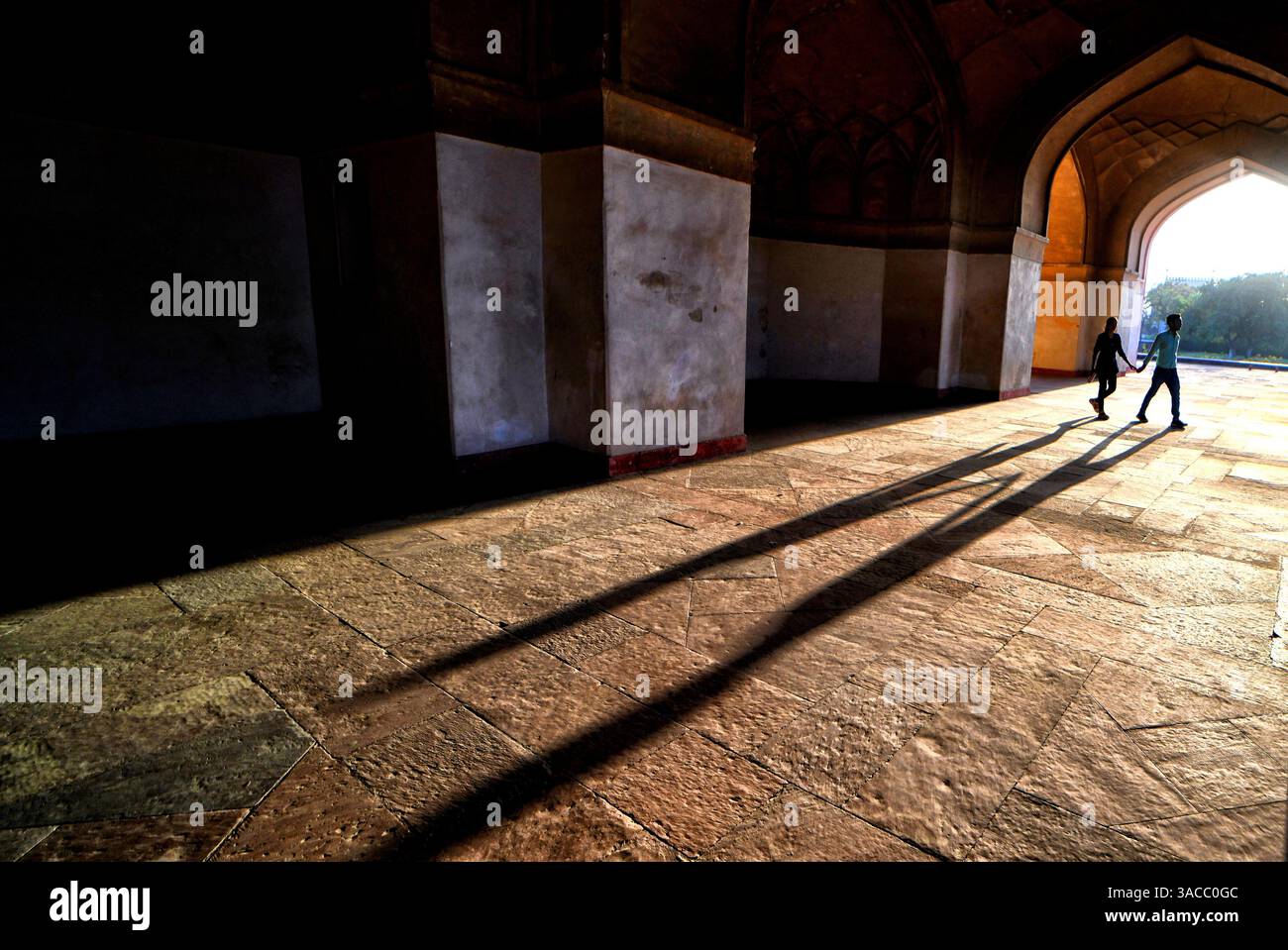A couple seen walking inside of Sikandra Fort in the late evening where ...