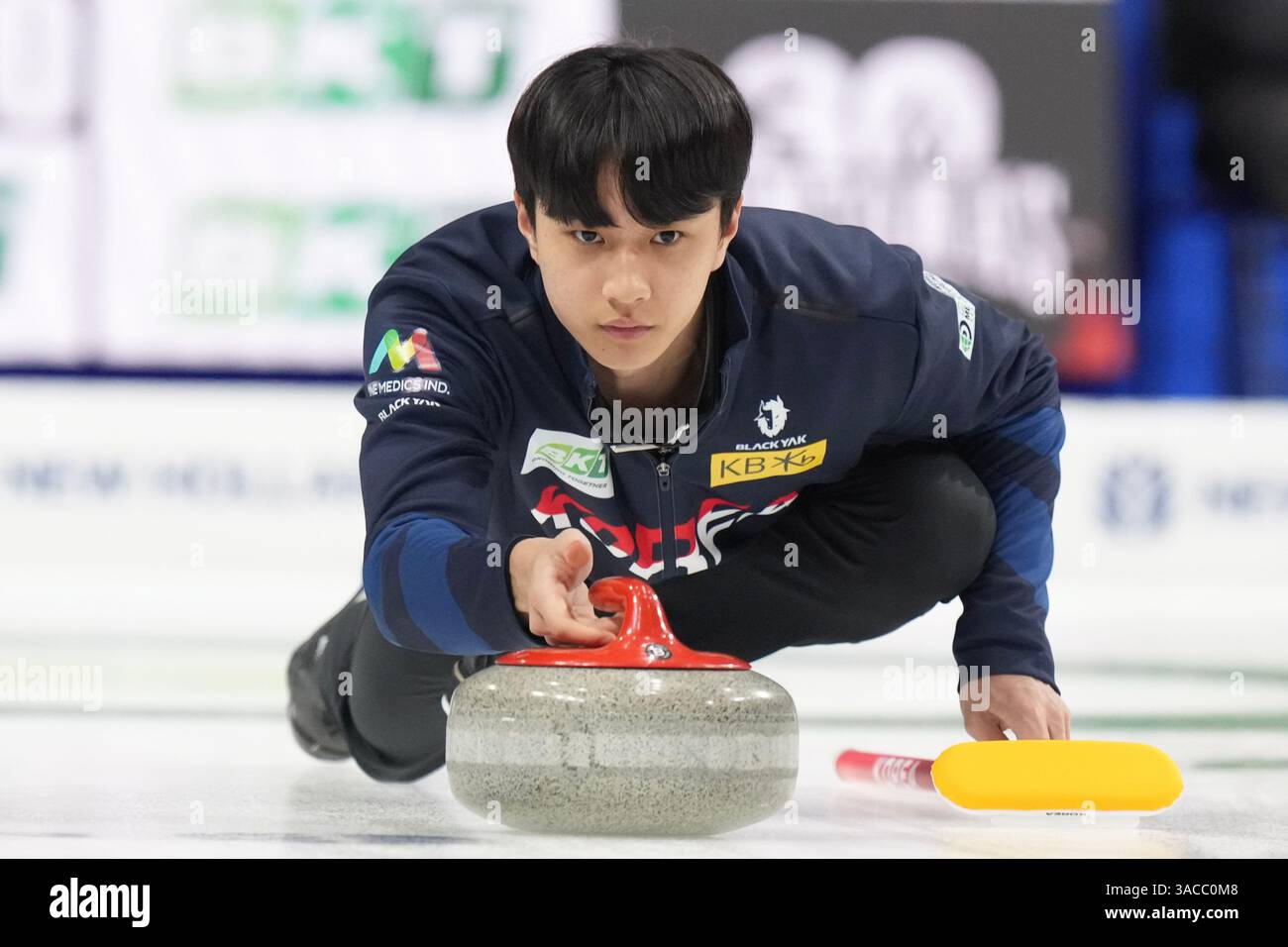 Moose Jaw, Can. 03rd Apr, 2025. South Korea's Hyojun Kim throws a stone during his country's ...