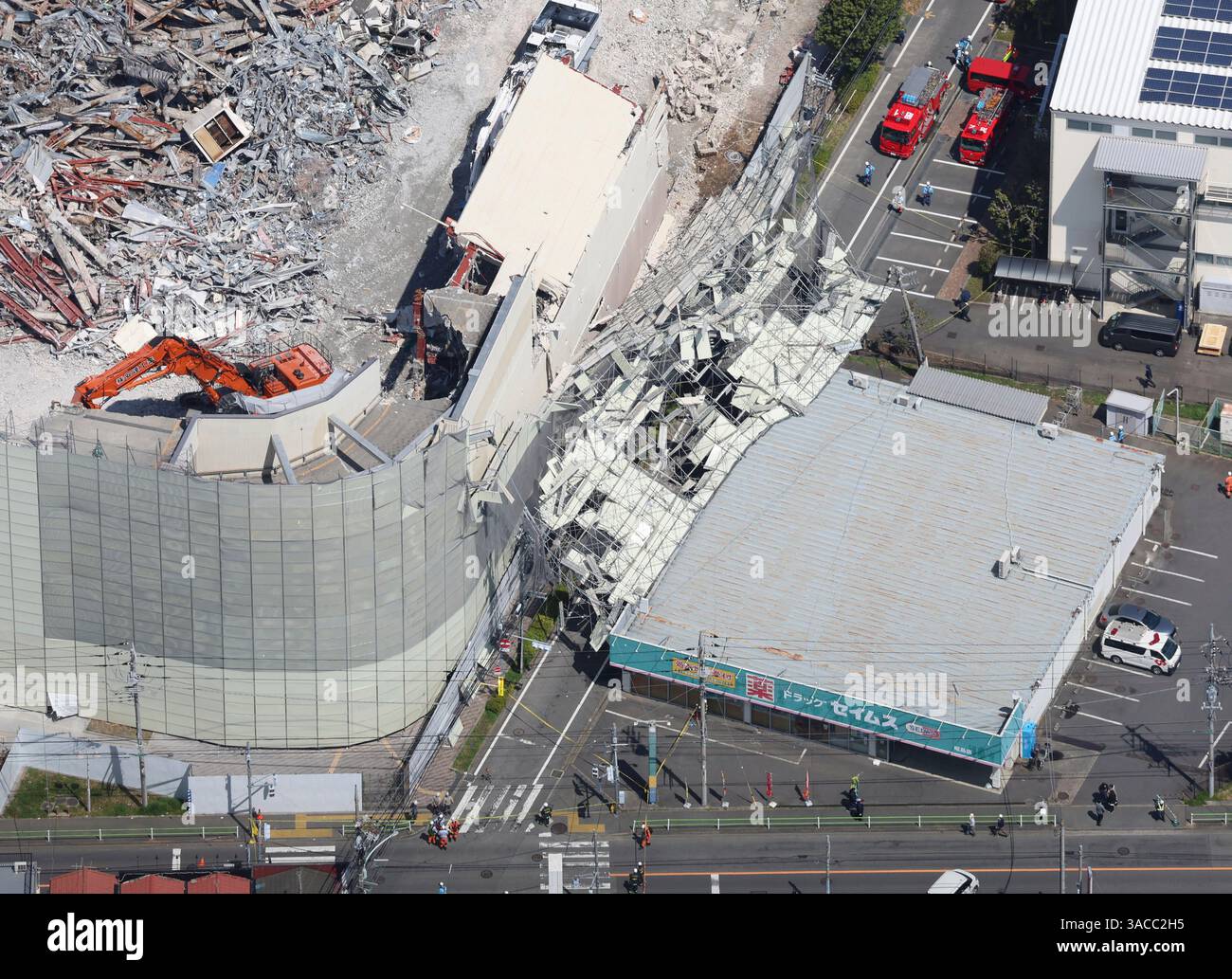 An aerial photo shows a demolition site where scaffolding collapsed in ...