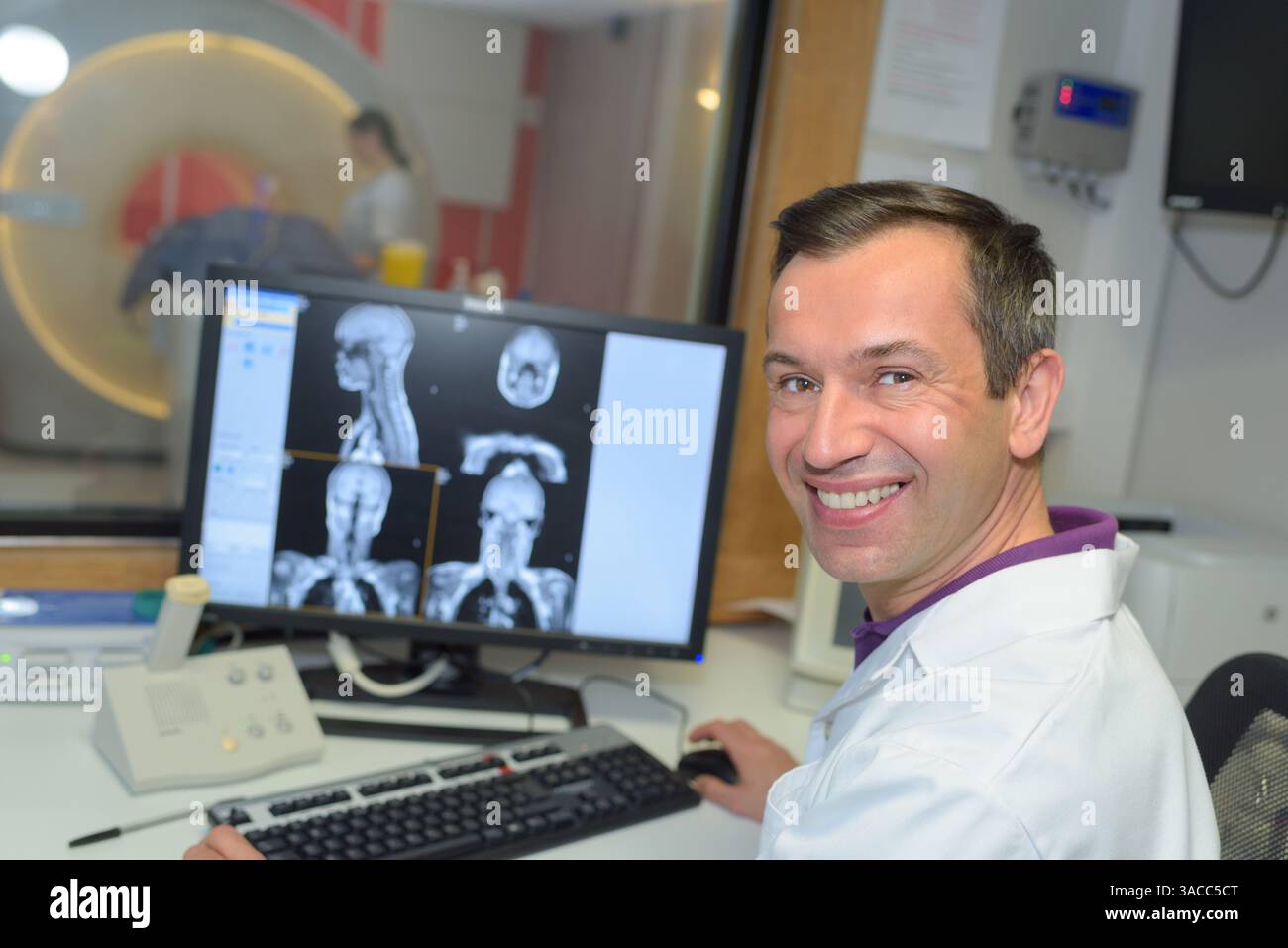 radiologist with computer images from mri scanner Stock Photo - Alamy
