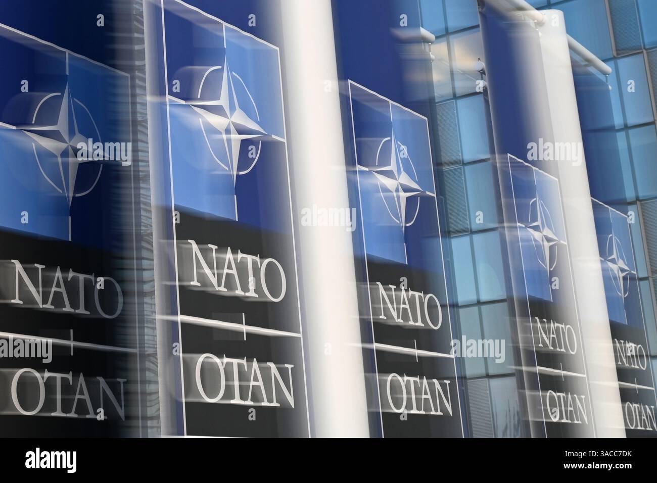 04 April 2025, Belgium, Brüssel: Several NATO emblems can be seen next ...