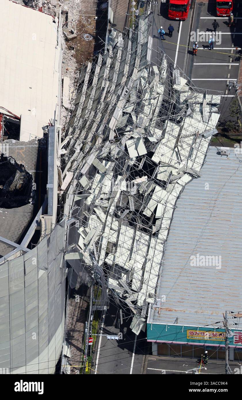 An aerial photo shows a scaffolding collapsed in Akishima City, western ...