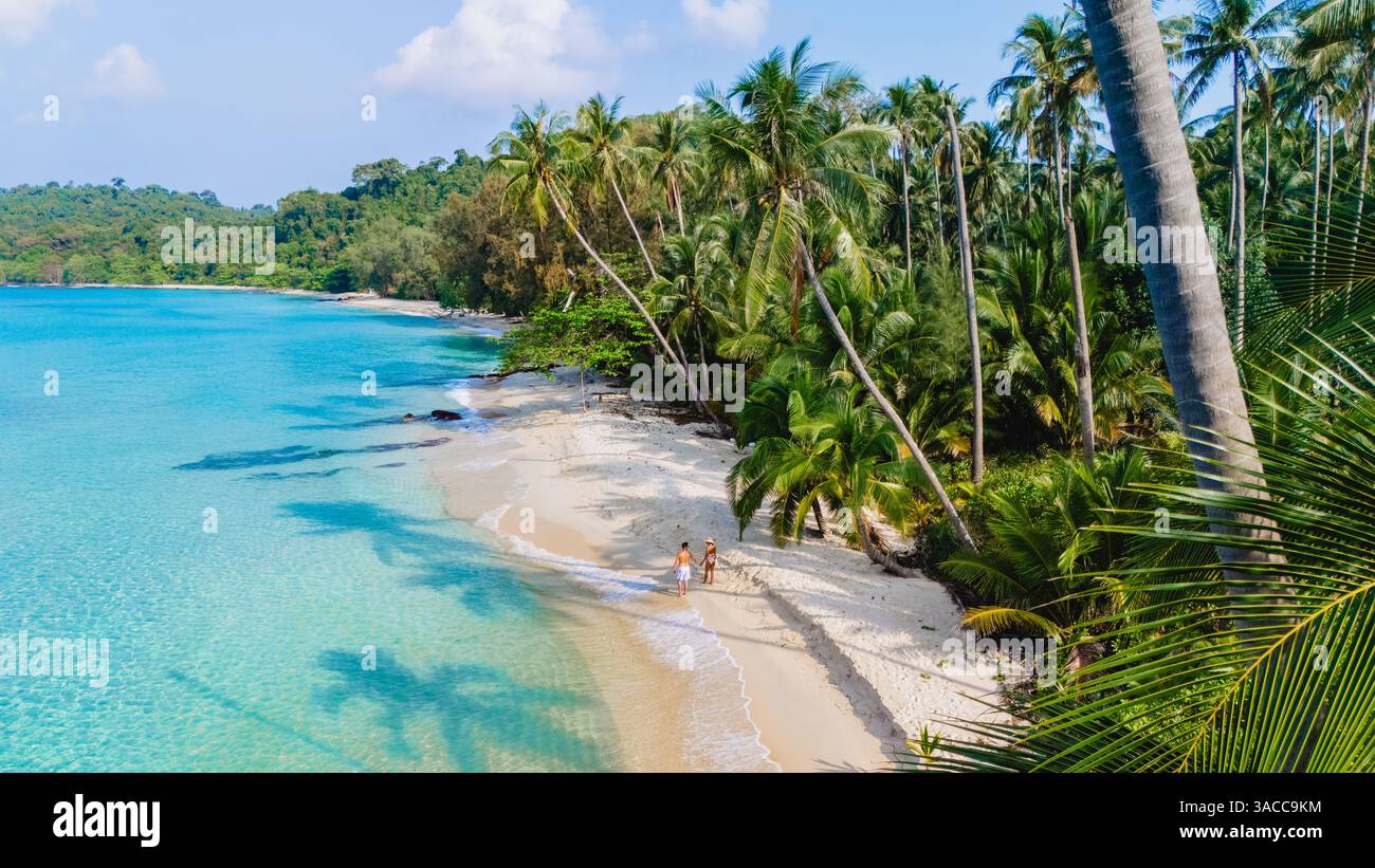 Discover the stunning beach landscape of Koh Kood Island in Thailand, where clear turquoise ...