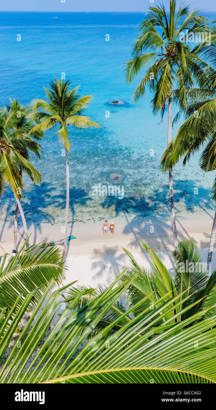 Experience the stunning beauty of Koh Kood Island, Thailand, with its pristine beaches and clear ...