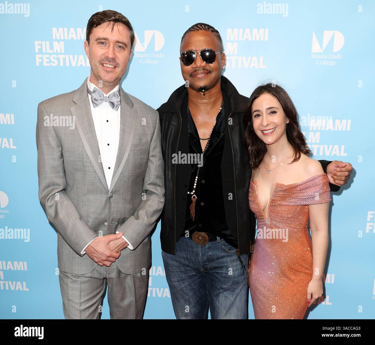 MIAMI, FL-APRIL 3: James Wooley, Cuba Gooding Jr., and Lauren Cohen are ...