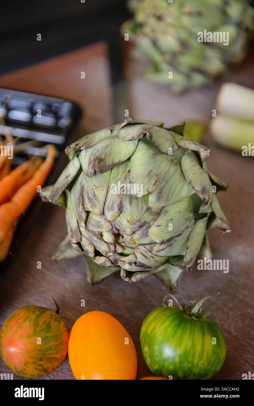 Fresh vegetables including an artichoke Stock Photo - Alamy