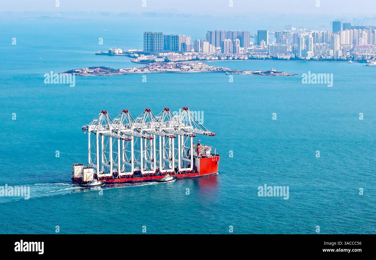 QINGDAO, CHINA - APRIL 4, 2025 - Five ultra large quayside container cranes that can handle the ...