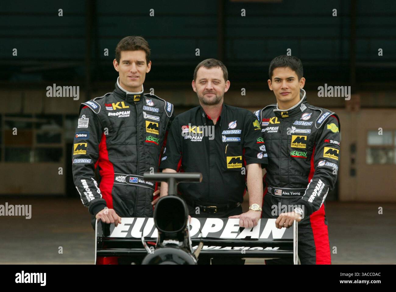 L-R. Mark Webber (AUS), Minardi Team Owner Paul Stoddart (AUS) and Alex ...
