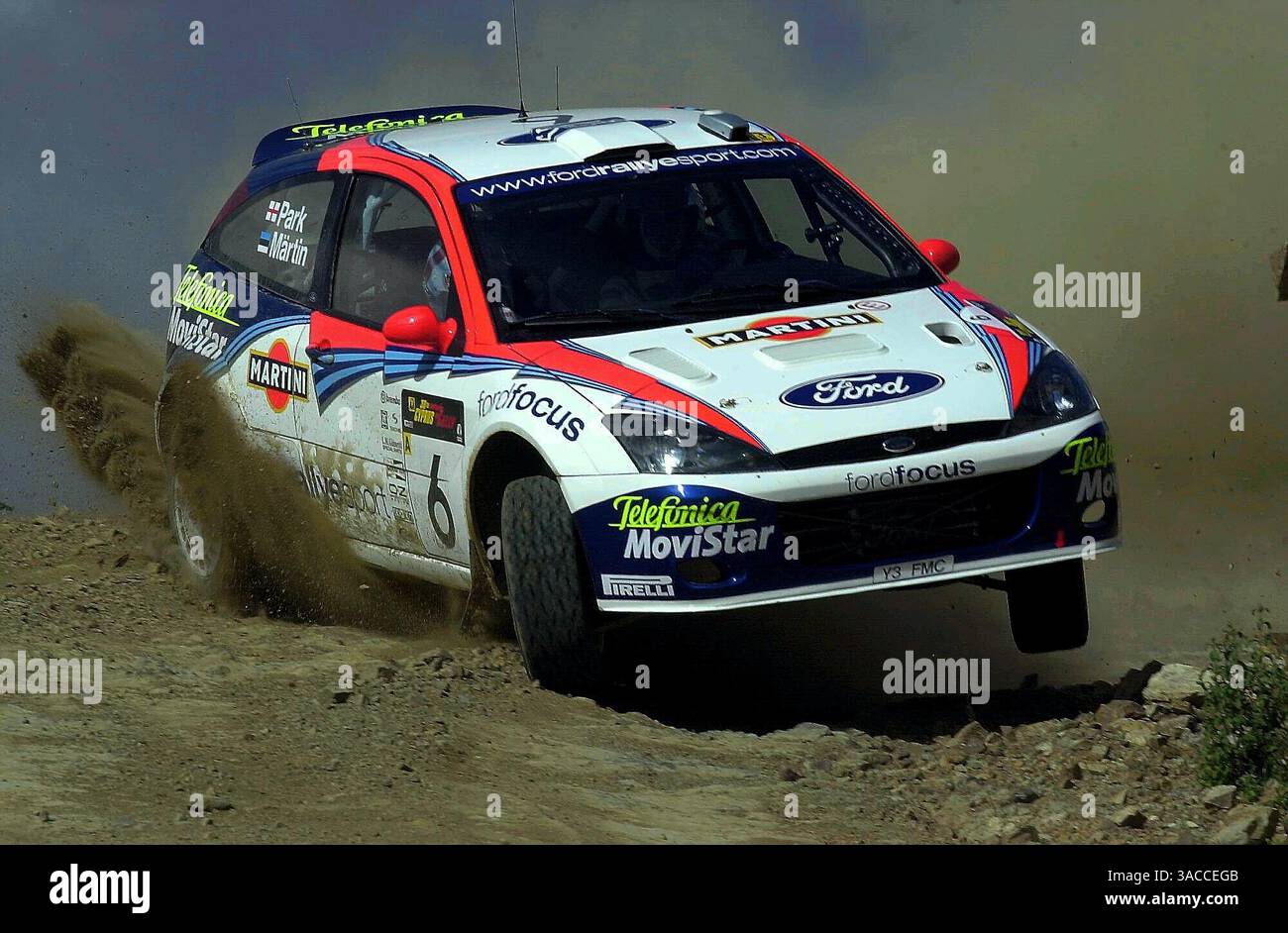 Markko Martin (EST) lifts a wheel on his Ford Focus RS WRC on Stage 1 ...