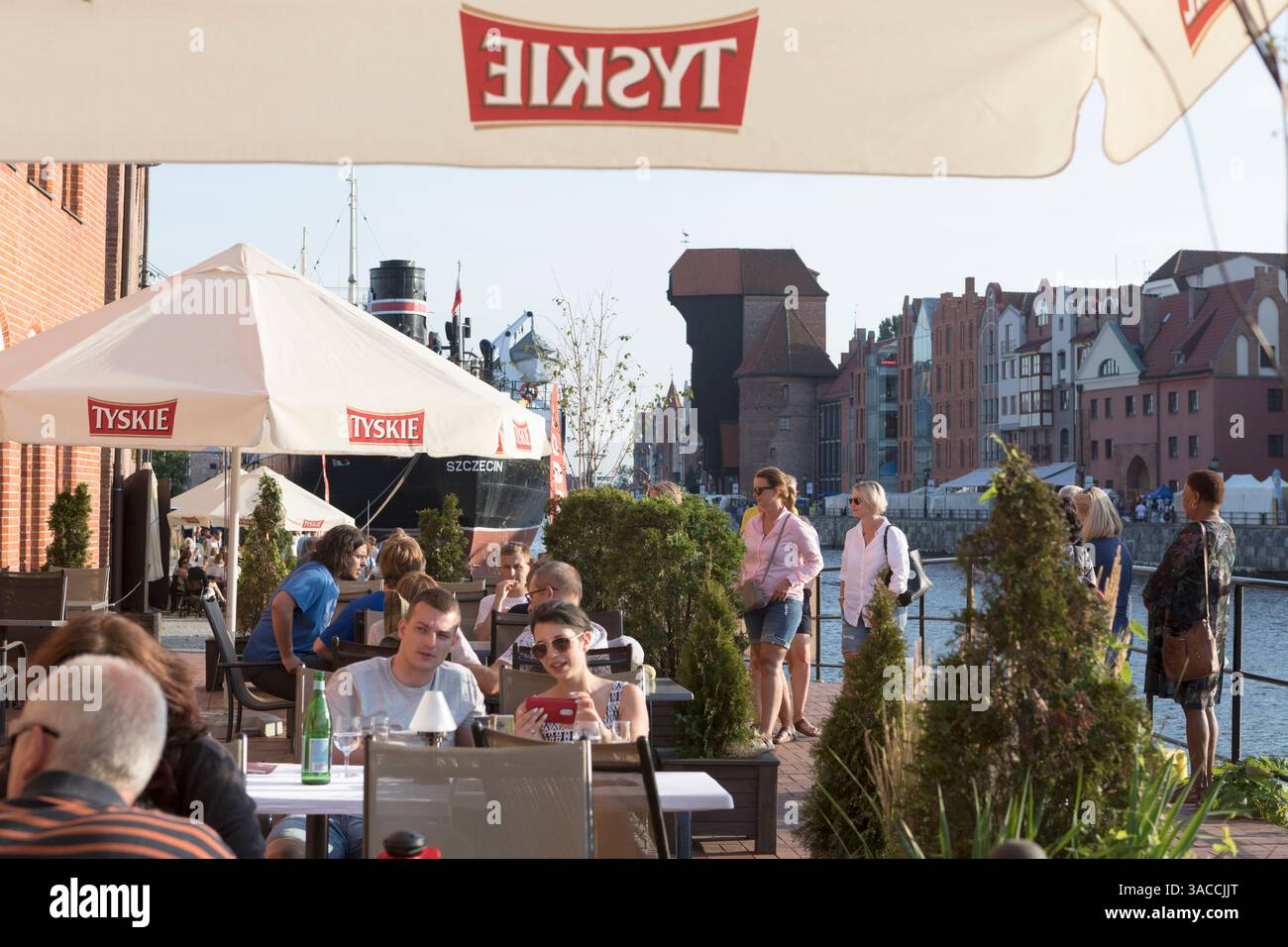 Gdansk, Poland, sitting area for bars along the waterfront Stock Photo ...