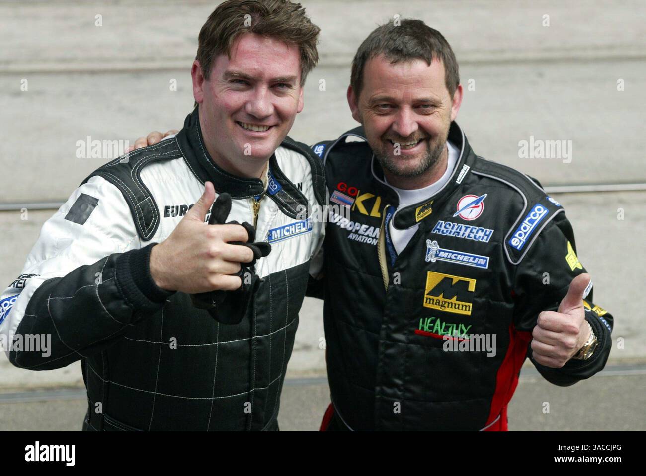 Eddie McGuir (AUS) TV Presenter and Minardi team owner Paul Stoddart ...