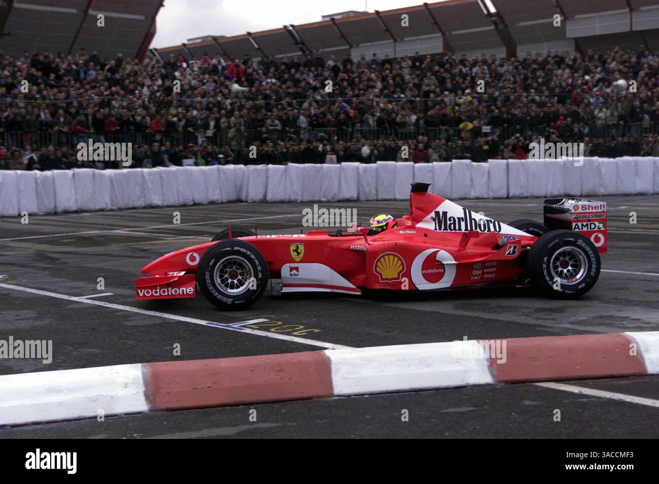Luciano Burti (BRA) Ferrari Test Driver demonstrates the Ferrari F2002 ...