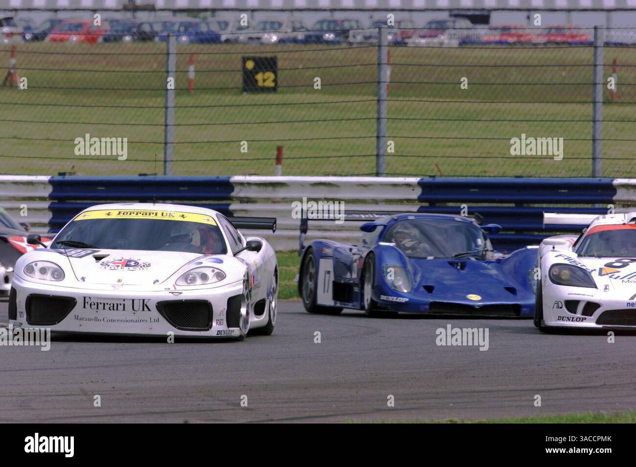 The Ferrari F360 of Calum Lockie(GBR) and Jamie Davis (GBR) lead the ...