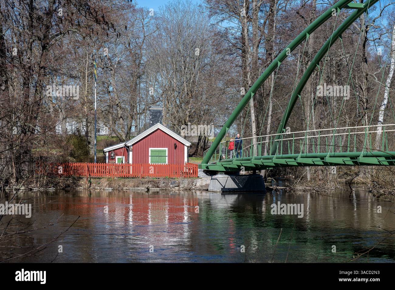 The New Five-Penny bridge at waterfront park Åbackarna across Motala ...