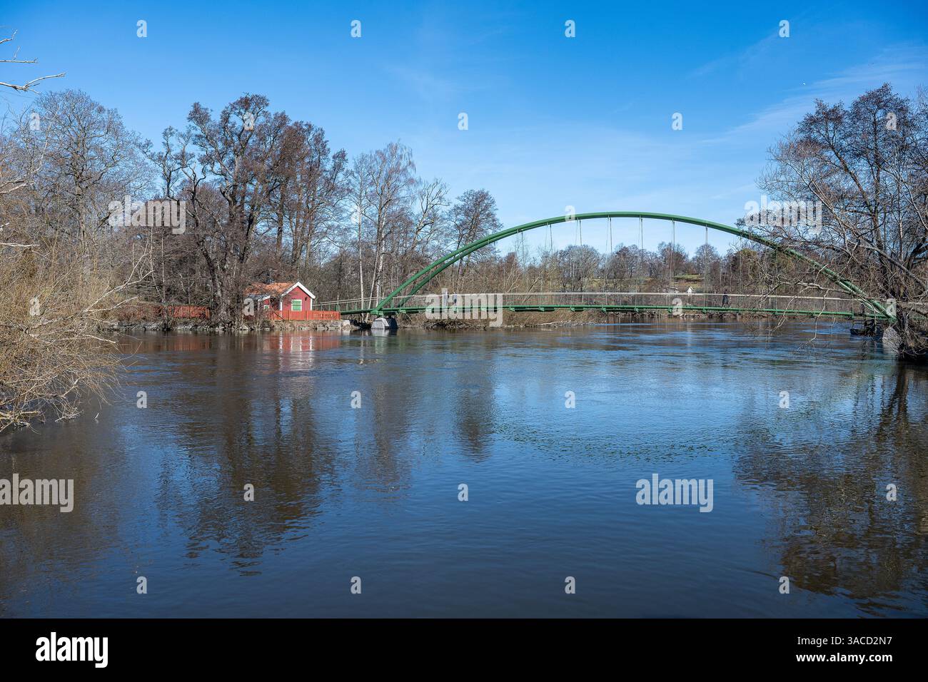 The New Five-Penny bridge at waterfront park Åbackarna across Motala ...