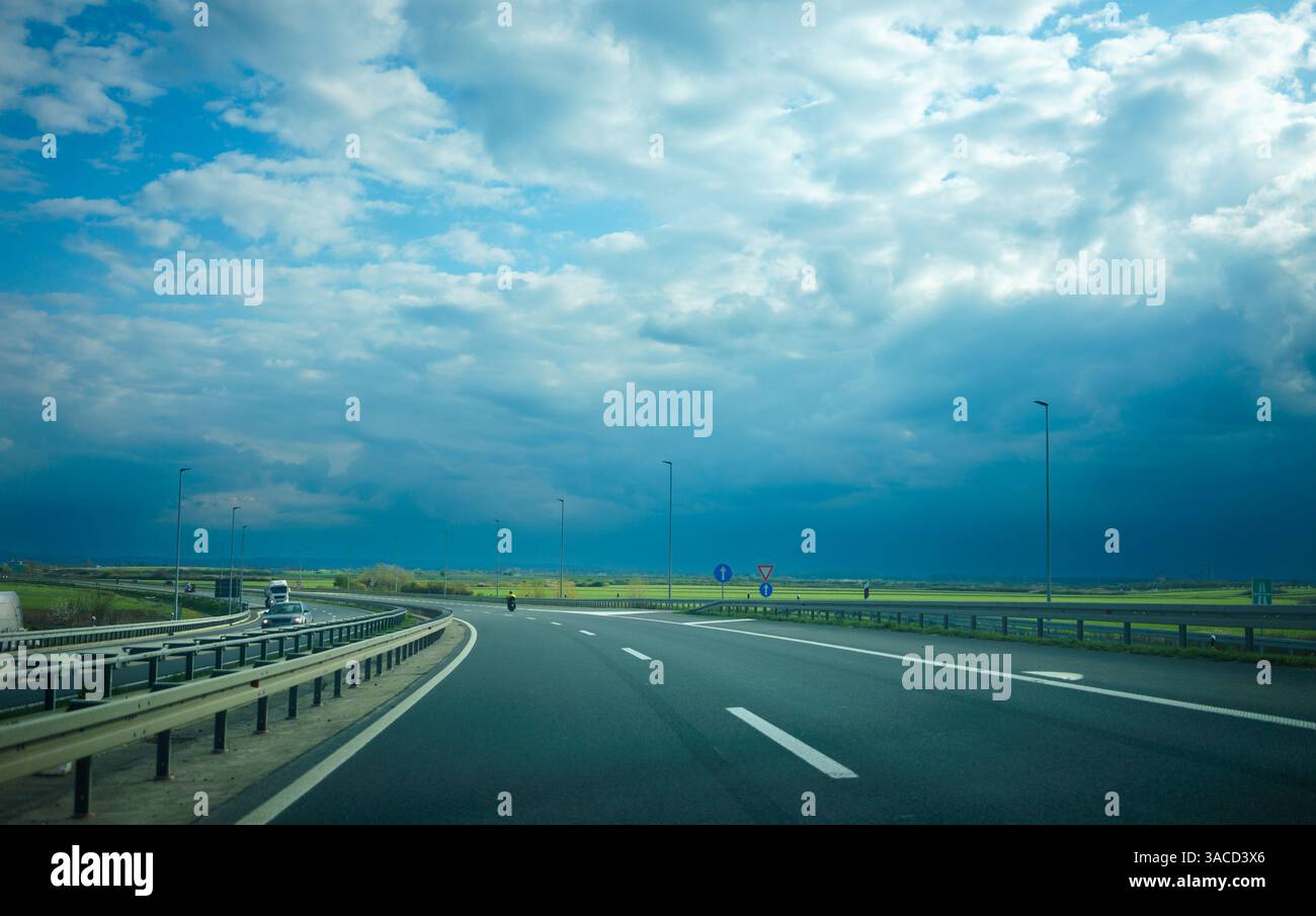 Driving on the highway in the spring Stock Photo - Alamy