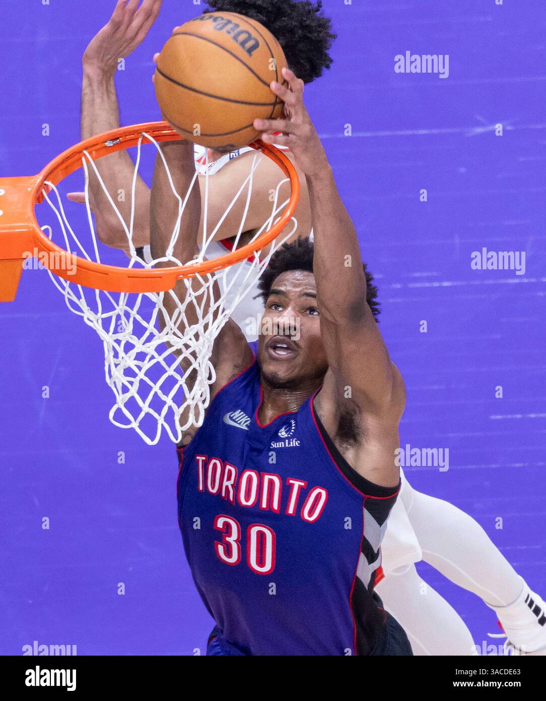 Toronto, Canada. 3rd Apr, 2025. Ochai Agbaji of Toronto Raptors dunks during the 2024-2025 NBA ...