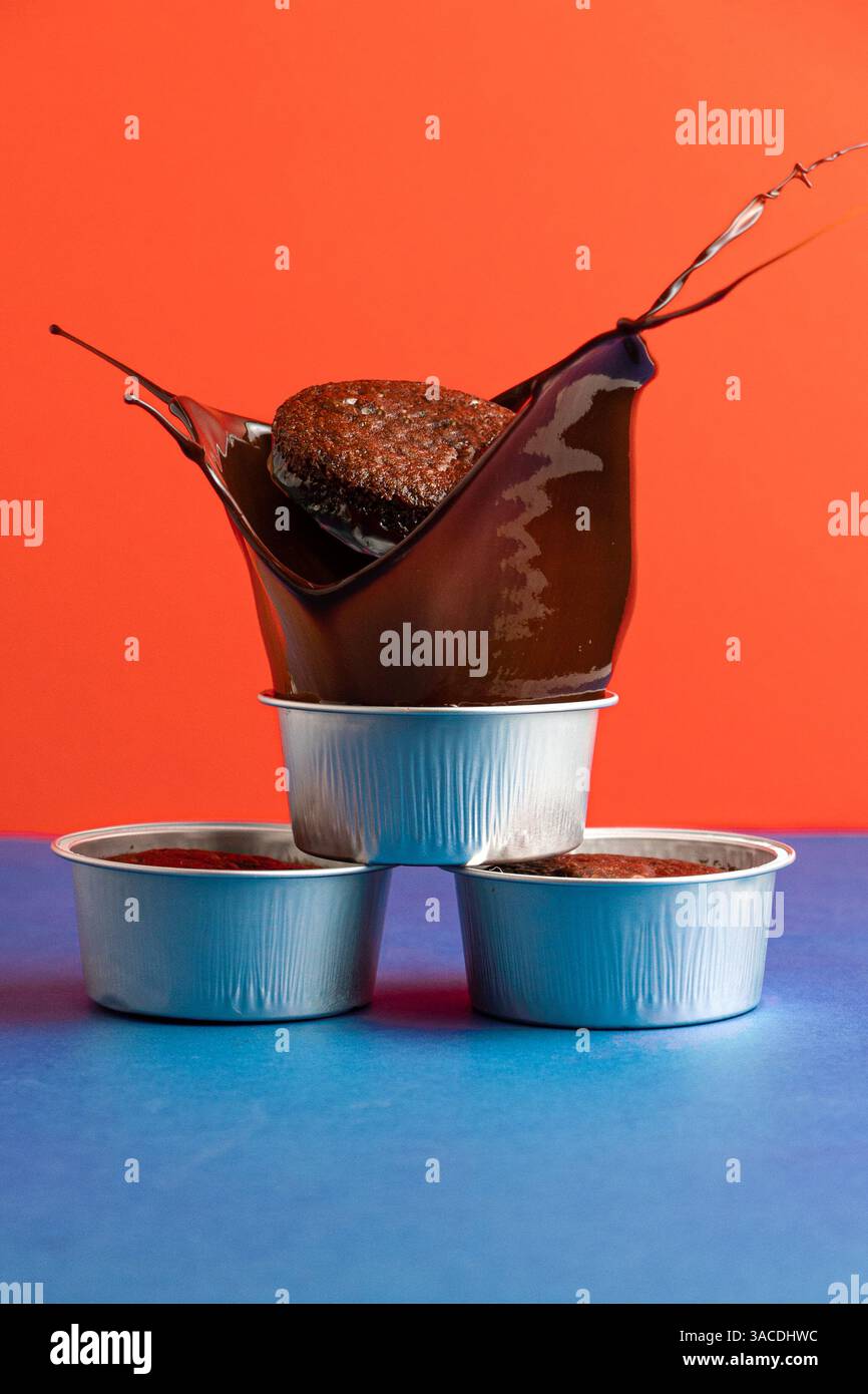 Chocolate Cake Drop into Molten Cup with Splash – vibrant color Dessert ...