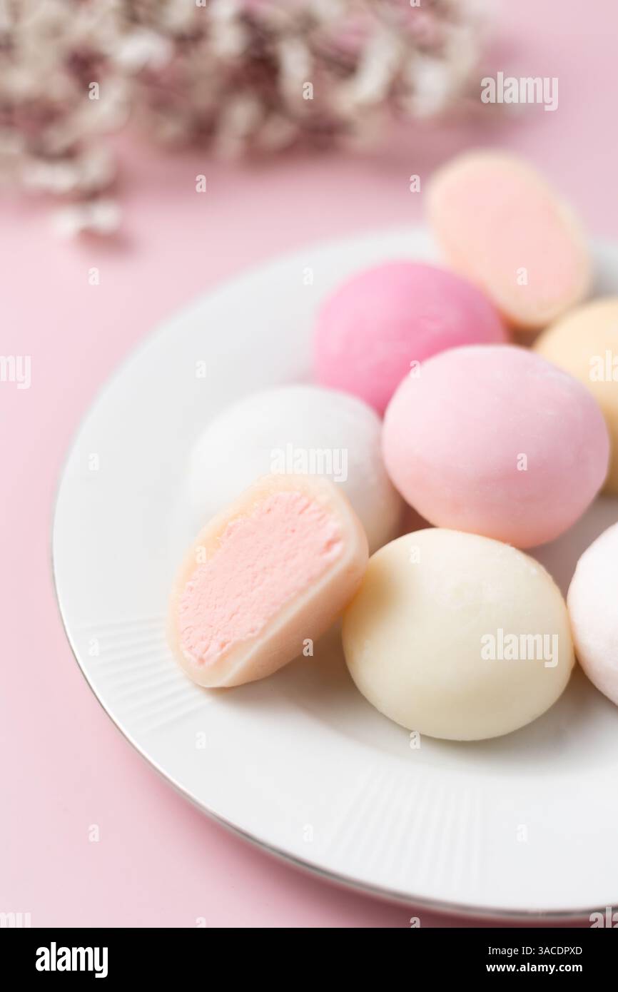 colorful frozen mochi with vibrant color background Stock Photo - Alamy