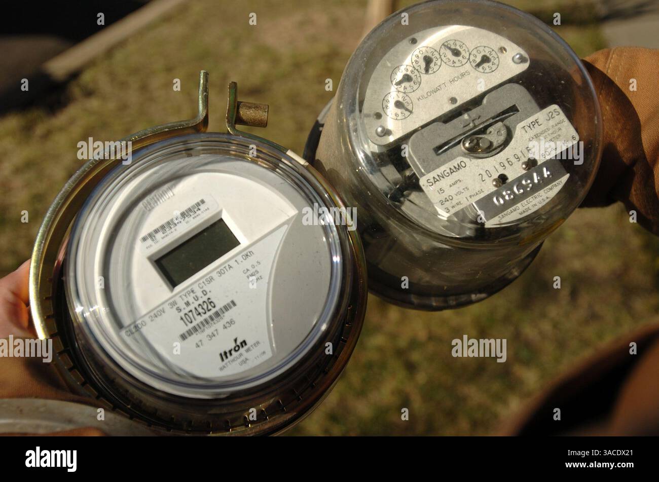 SMUD is installing new power meters, at left above, at private homes ...