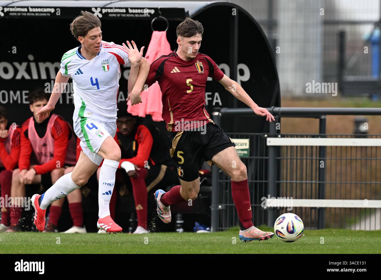 Tubize, Belgium. 21st Mar, 2025. Matteo Mantini (4) of Italy and Mael ...