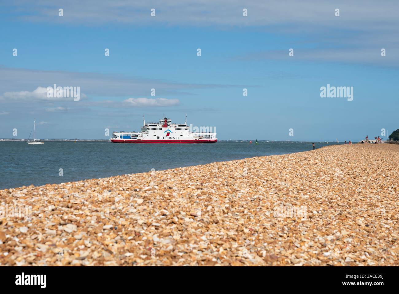 A Red Funnel car ferry arrives at Cowes on the Isle of Wight on a sunny ...