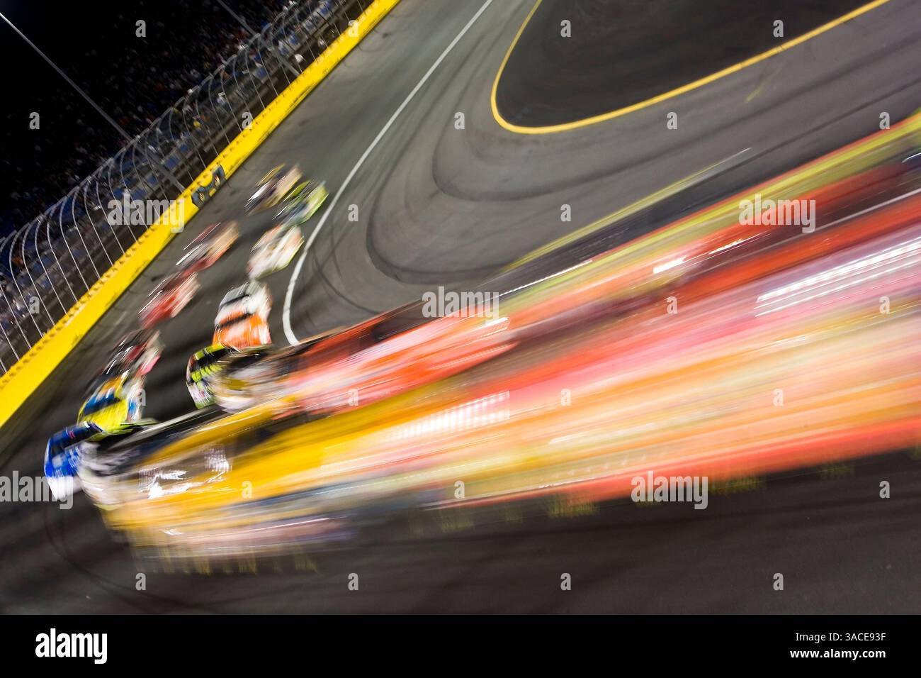 The field streams through turn 4 at the NASCAR All-Star Challenge in ...