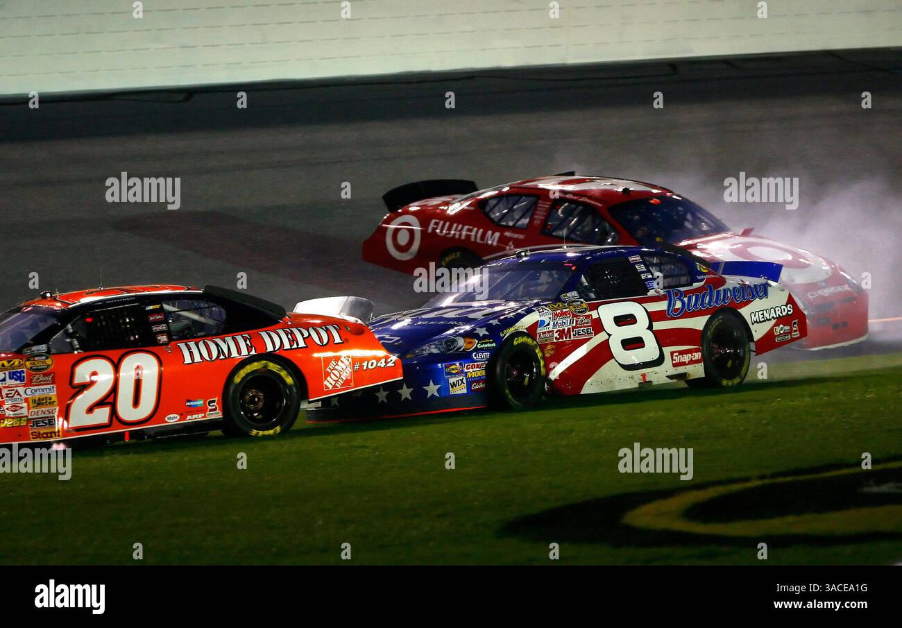 Dale Earnhardt Jr. gets into Tony Stewart on the tri-oval grass during ...