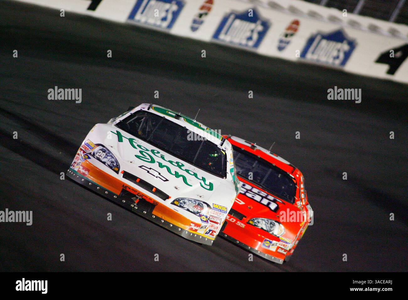 Jeff Burton leads Dale Earnhardt Jr. through turn four during Friday's ...