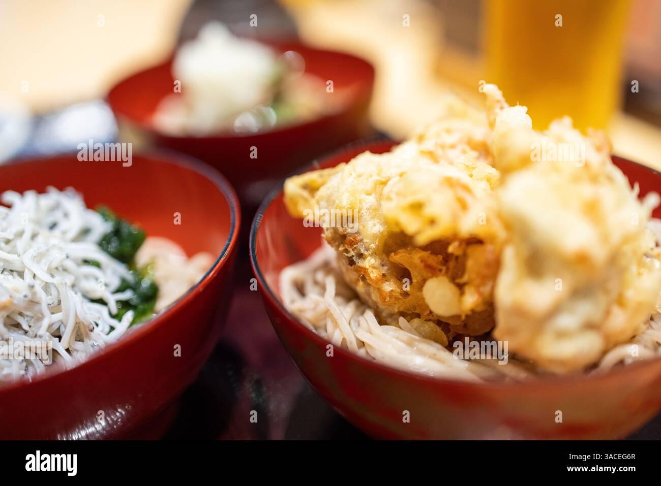 Japanese meal featuring soba noodles with kakiage tempura The crispy ...
