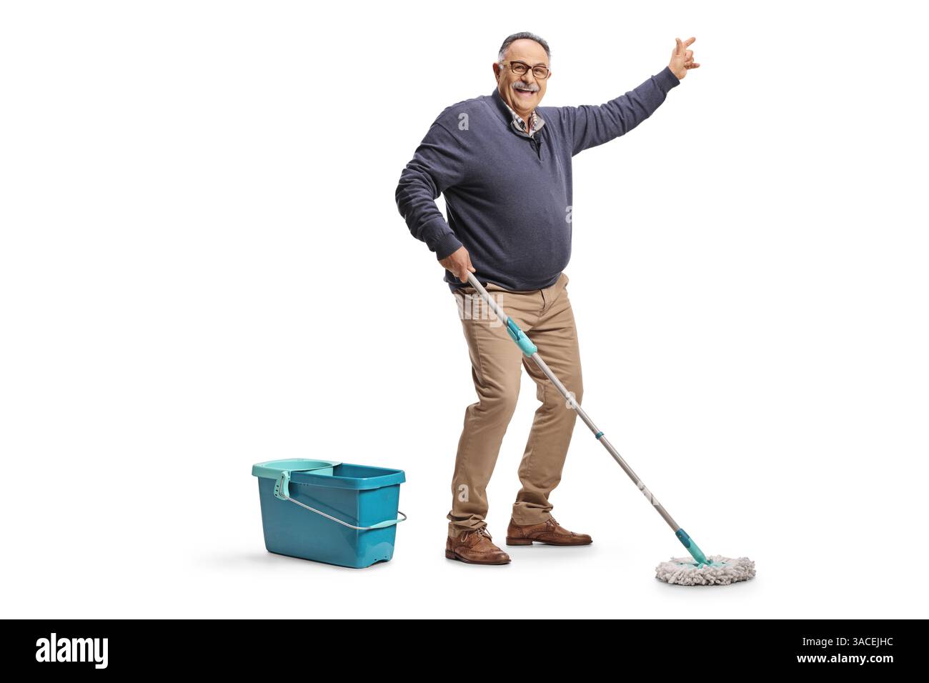 Smiling cheerful mature man cleaning floor with a mop isolated on white ...