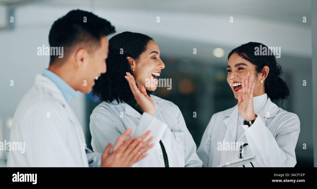 High five, collaboration and scientists in laboratory with medical ...
