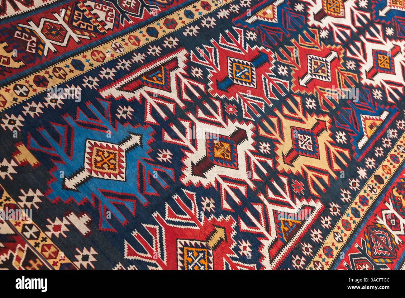 Vintage Azerbaijani handmade wool carpet featuring intricate geometric ...