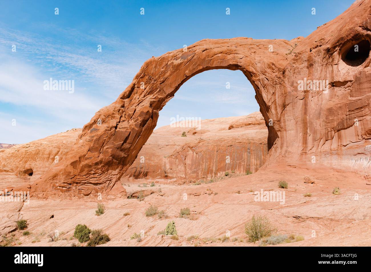 Iconic Desert Arch in Moab Framed Against a Vibrant Blue Sky Stock ...