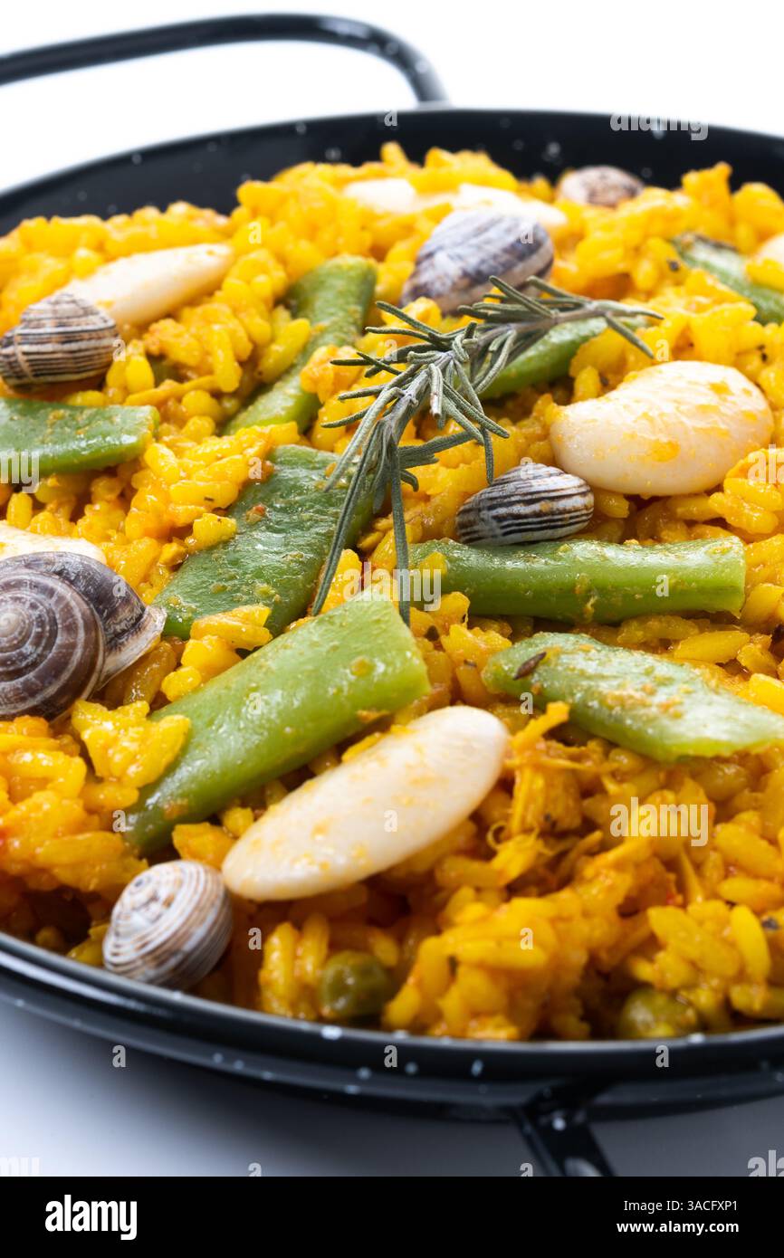 Traditional Valencian paella with rabbit, chicken, garrofon beans ...