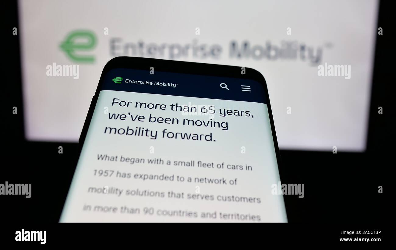 In this photo illustration, a mobile phone with the logo of US mobility ...