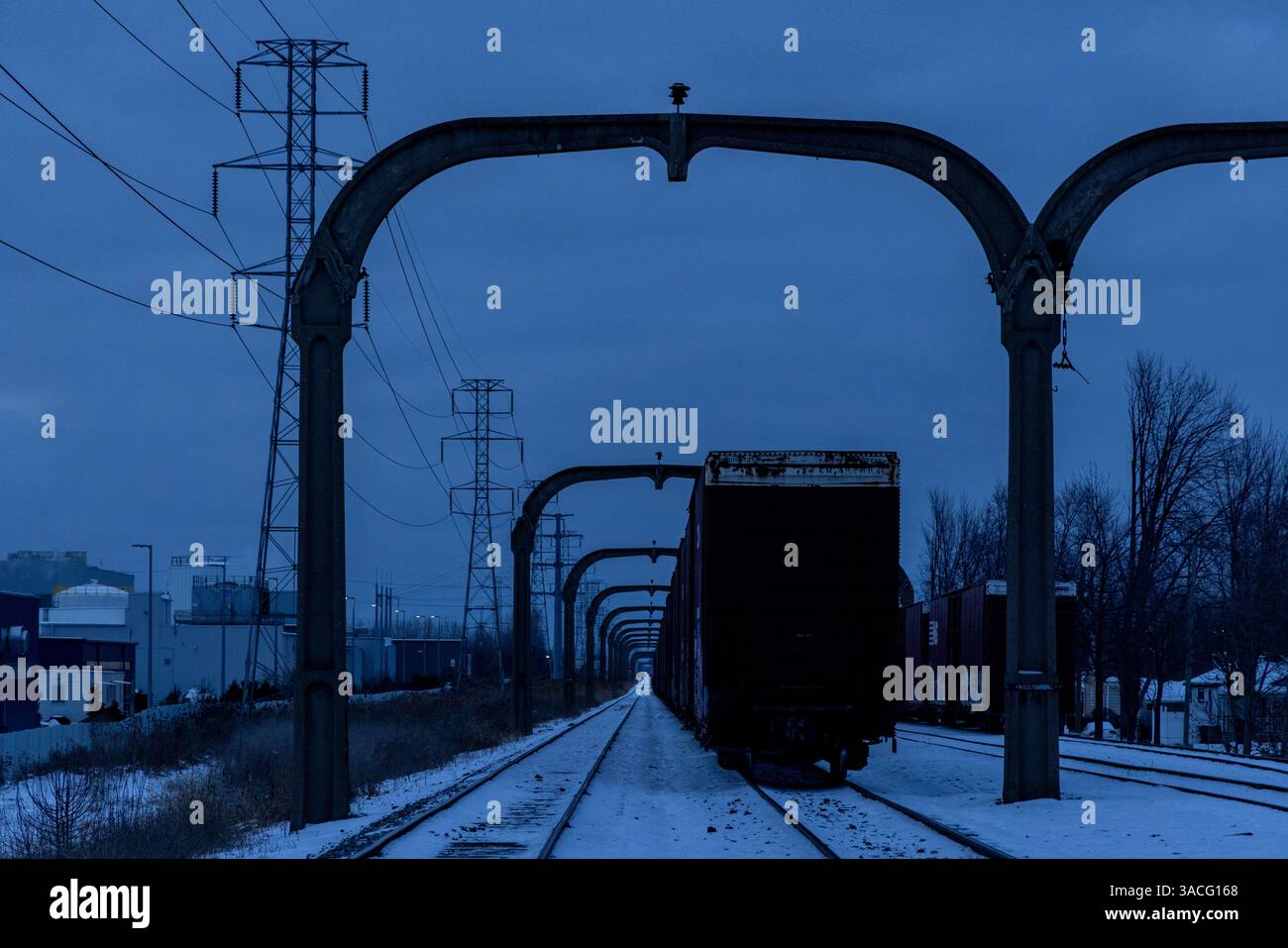 Historic catenary arches over train tracks Stock Photo - Alamy