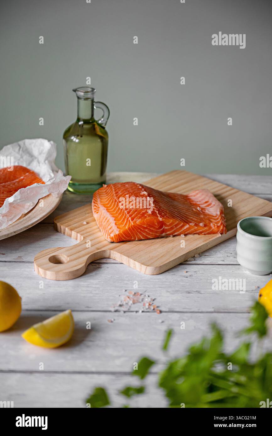 Fresh uncooked salmon fillet with pink salt and vegetable oil Stock ...