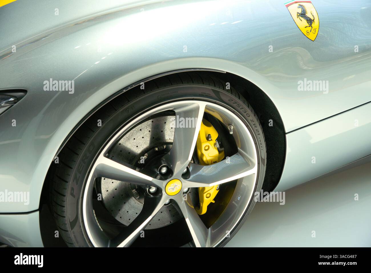Ferrari Monza SP1 sports car on display. Shot shows the front wheel with the Ferrari horse logo ...