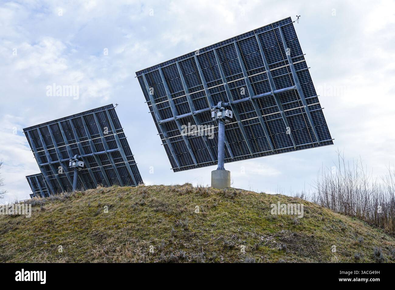 Solar Tracking Panels on a Hill Stock Photo - Alamy