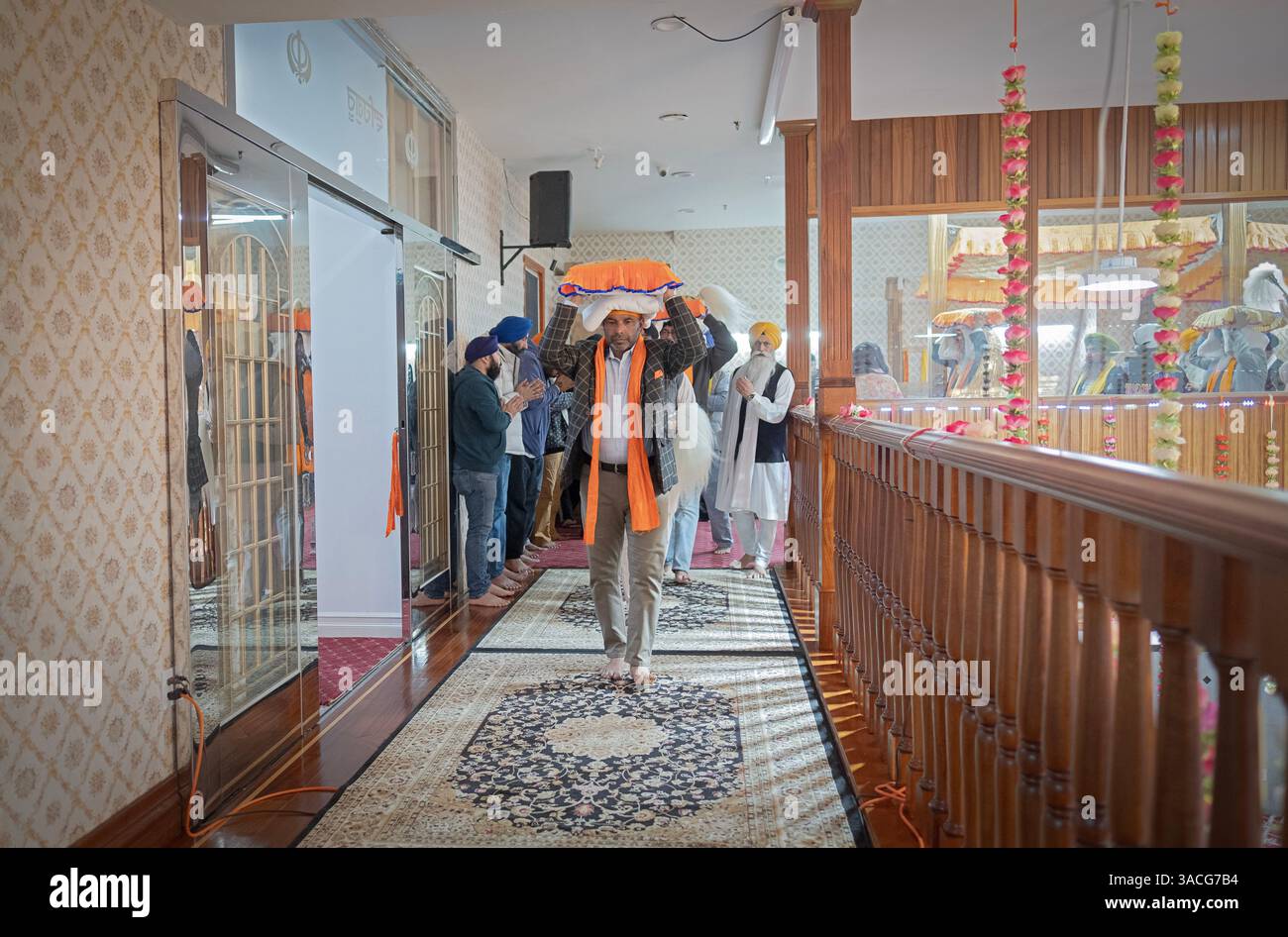 After a morning service where the entire Sikh bible is read worshippers ...