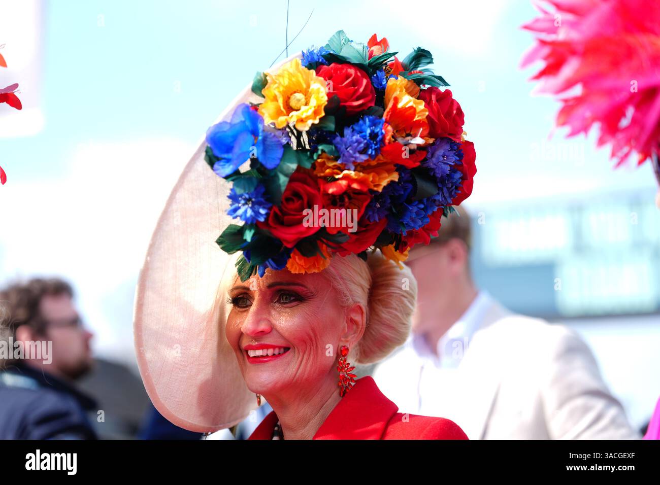 Racegoers wearing colourful hats on day two of the Randox Grand ...