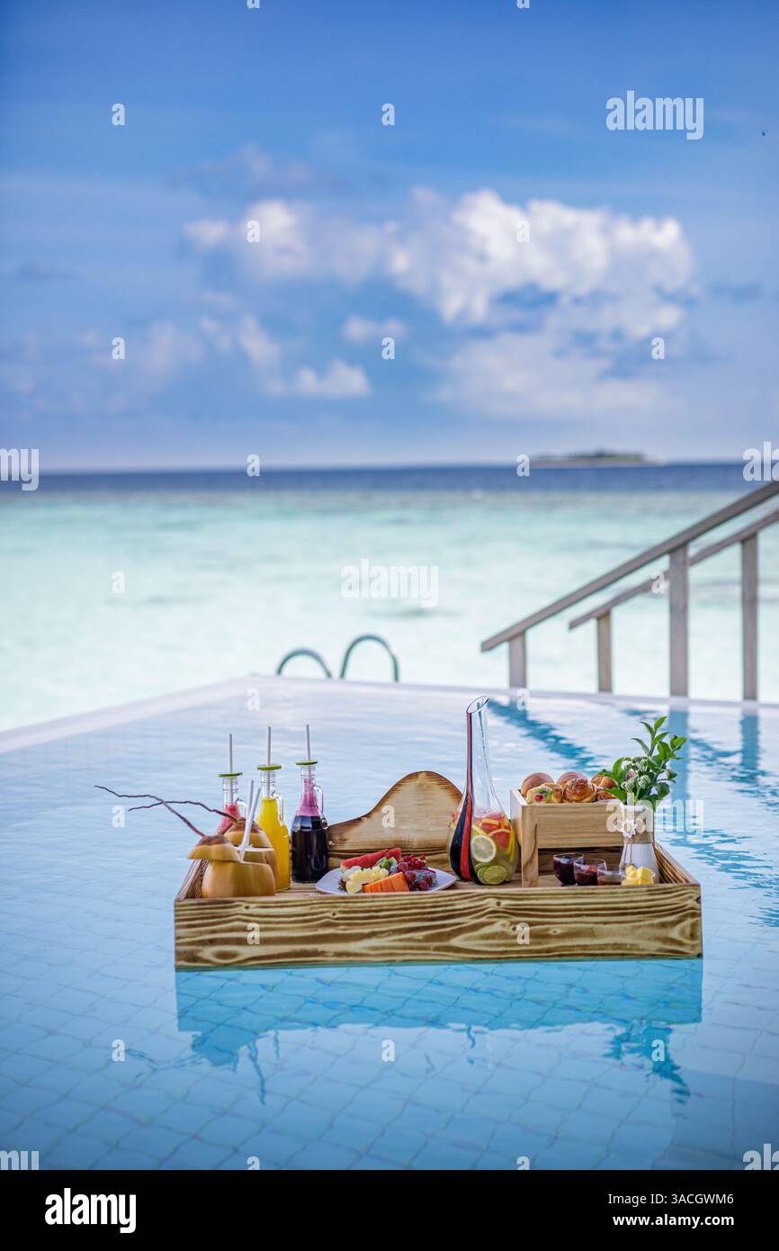 Breakfast in swimming pool, floating breakfast in luxurious tropical ...